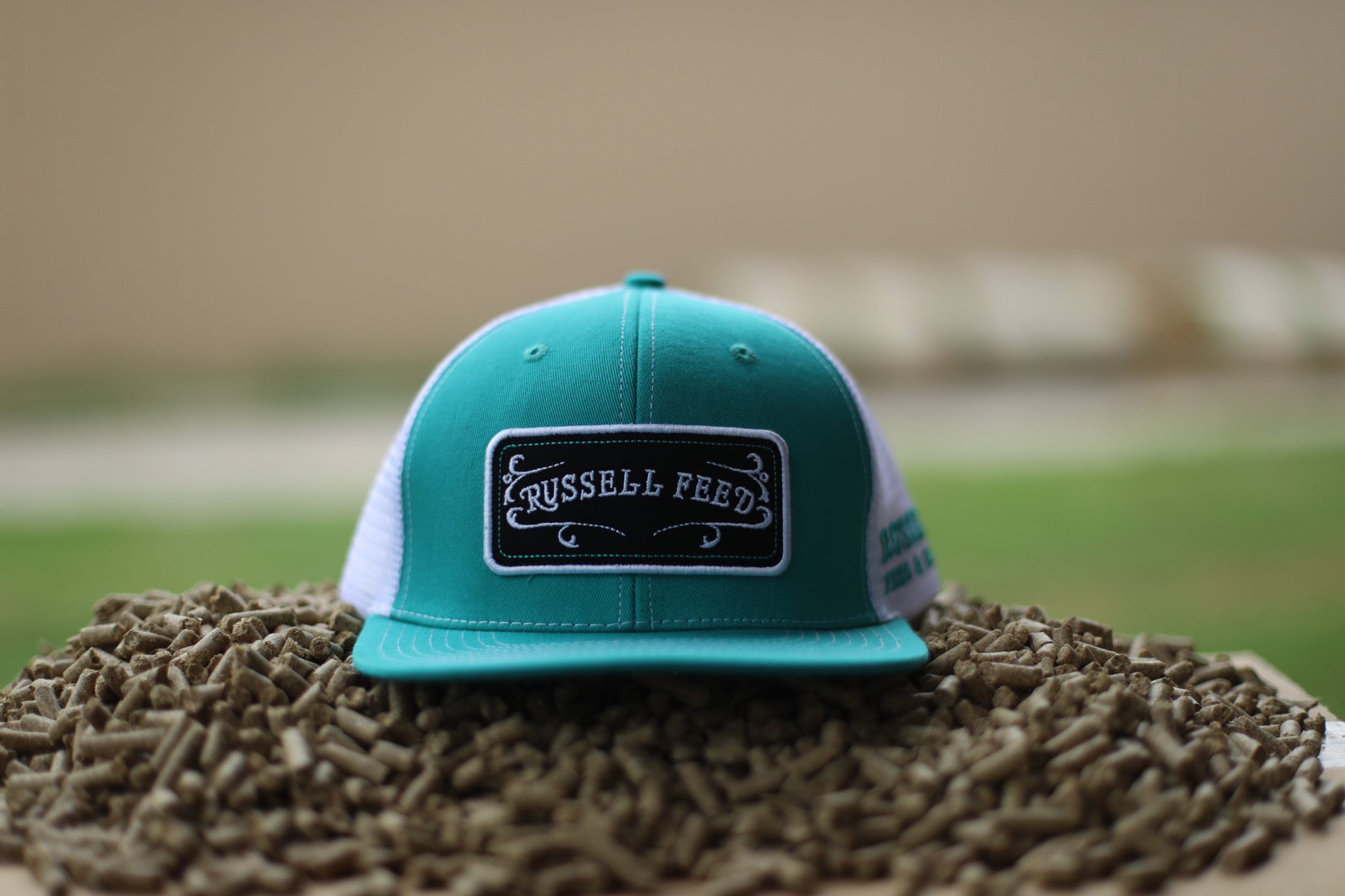 Caps and Apparel — Russell Feed & Supply